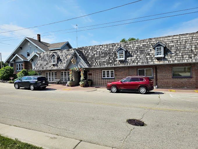 Brick, charm, and delicious harm (to your diet). This quaint exterior hides a world of culinary indulgence.