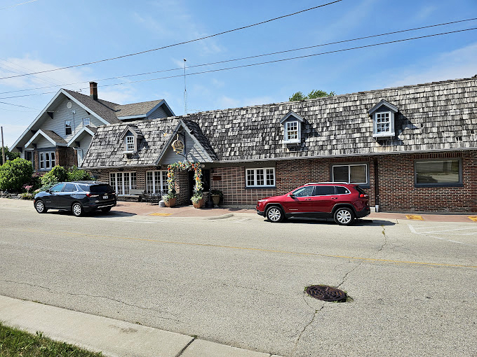 Brick, charm, and delicious harm (to your diet). This quaint exterior hides a world of culinary indulgence.