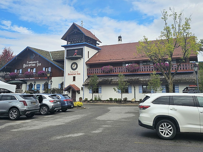 The clock tower and wooden balconies of this Bavarian-inspired building create an authentic European village atmosphere.