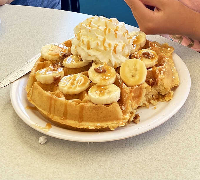 Waffles that deserve their own Instagram account &ndash; crispy outside, fluffy inside, topped with bananas and enough whipped cream for a small village.