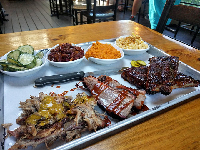 Barbecue nirvana achieved: tender smoked meats share the spotlight with colorful sides on this perfectly balanced platter.