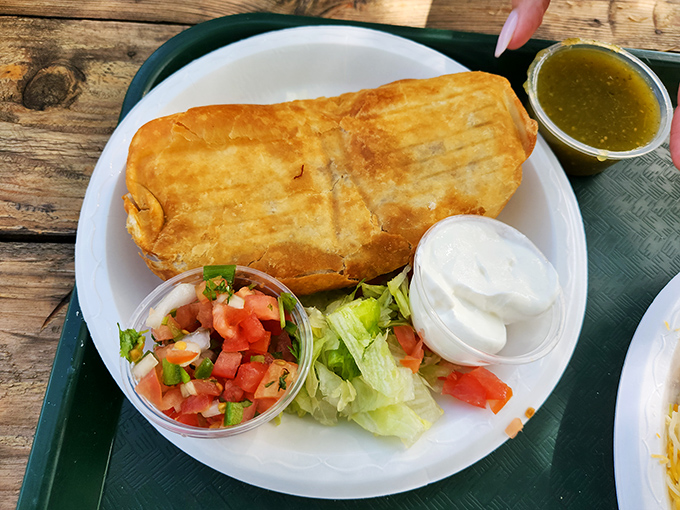 The chimichanga arrives golden-brown and crispy, with just the right ratio of filling to wrapper &ndash; a masterclass in deep-fried architecture.