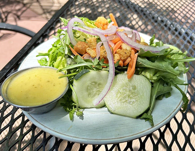 Fresh greens that actually taste like someone cared, proving salads don't have to be punishment for enjoying life.