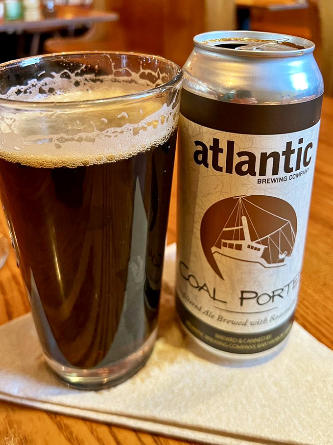 Local brews like this Atlantic Coal Porter complement the robust flavors of Italian cuisine, proving that beer and pasta can be soulmates too.