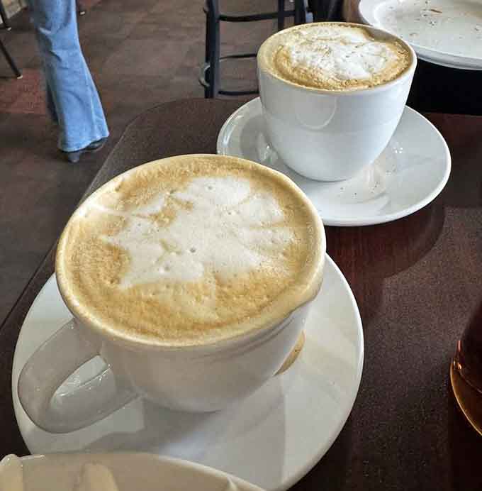 These lattes arrive with that perfect foam cap, providing necessary caffeination for the burrito battle ahead.