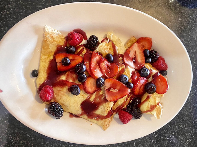Berry cr&ecirc;pes: Delicate pancakes gone French &ndash; wrapped around fresh berries and drizzled with syrup, they're breakfast's elegant cousin.
