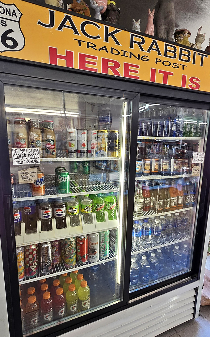 The refrigerator case offers sweet relief from desert heat, stocked with nostalgic glass-bottled sodas alongside modern thirst quenchers.