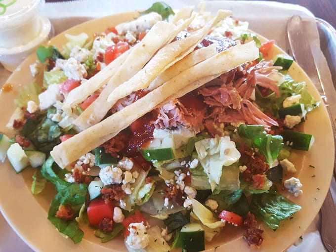 The Pig Salad proves you can have your greens and your barbecue too, like a mullet haircut but for lunch: business on the bottom, party on top.