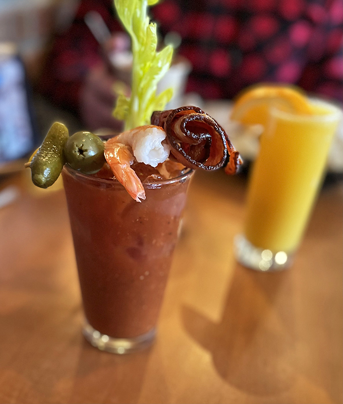Weekend recovery in a glass: this Bloody Mary, crowned with shrimp and pickle, makes "hair of the dog" look positively gourmet.