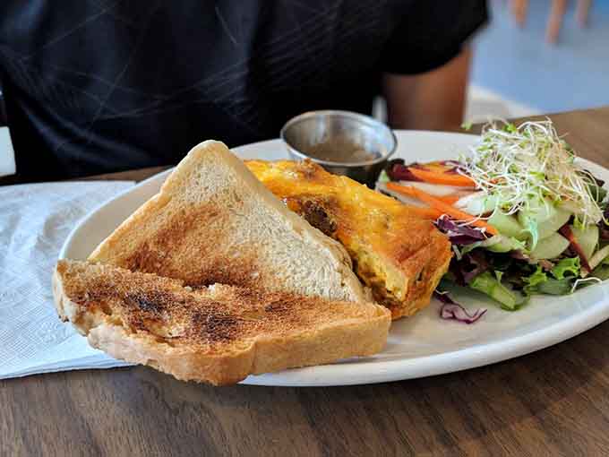 This frittata and toast combo proves that simple breakfast classics become extraordinary when someone actually cares about what they're cooking and serving.