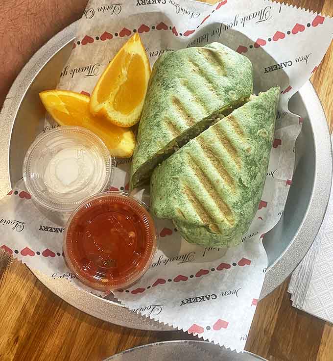 That spinach tortilla lets you pretend you're making healthy choices while enjoying breakfast burrito bliss.