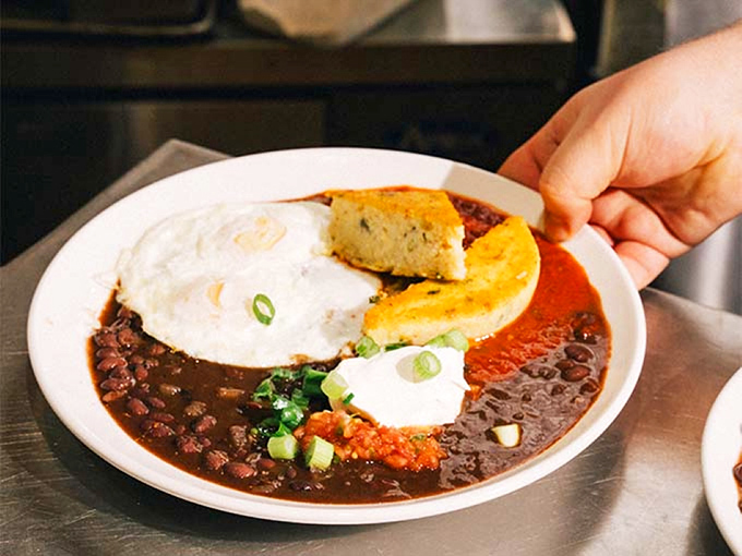 A symphony of textures and flavors &ndash; beans, eggs, and cornbread dancing together on a plate. Morning glory, indeed.