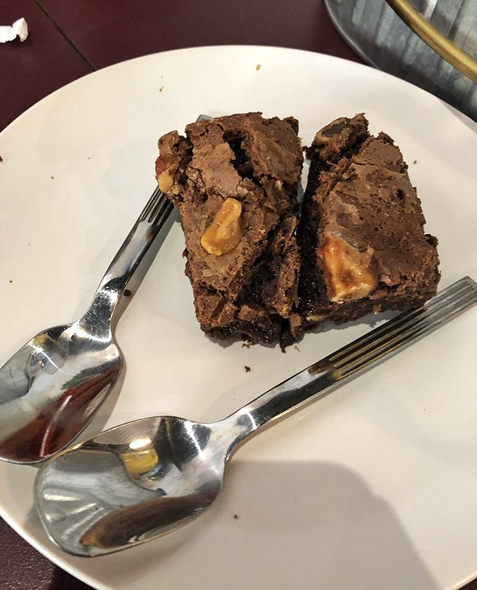 Fudgy, dense chocolate paradise studded with walnuts &ndash; the kind of brownie that makes you close your eyes and forget your table manners.