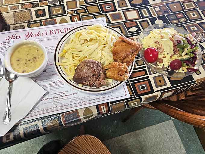 The buffet station in action, where hungry diners make the tough decisions about which delicious options to pile high.