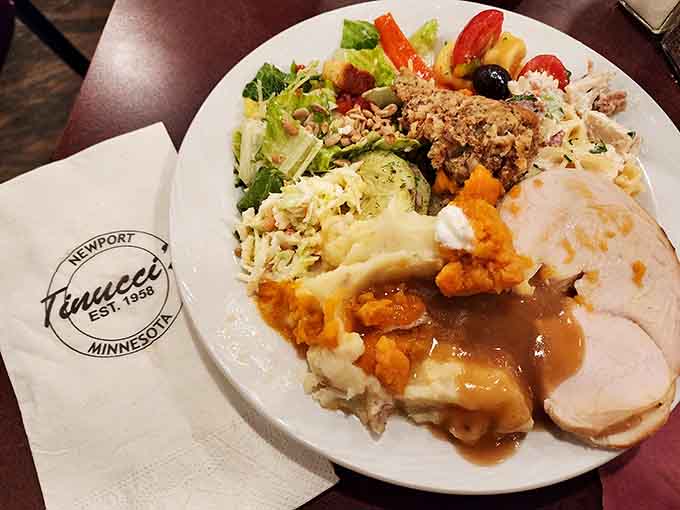 The buffet plate showcases the beautiful variety available, from turkey to salads to all the fixings.