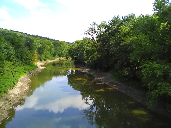 River reflections: The gentle Illinois River mirrors perfect blue skies as it winds through the landscape that has shaped the region's history.