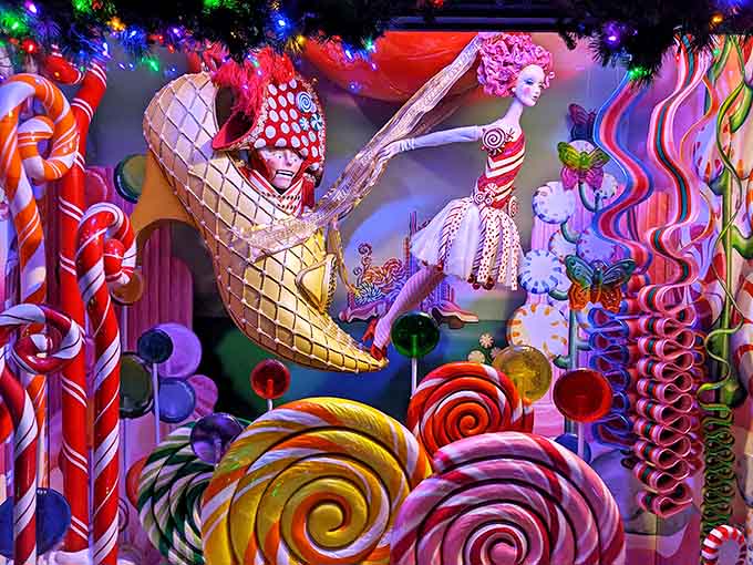 Whimsical figures dance among oversized sweets in this display that's part Nutcracker, part sugar-induced fever dream.