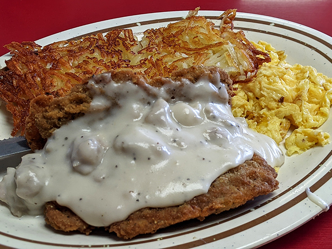 Country fried steak smothered in pepper gravy &ndash; the kind of breakfast that fuels Florida farmers and satisfies city slickers alike.