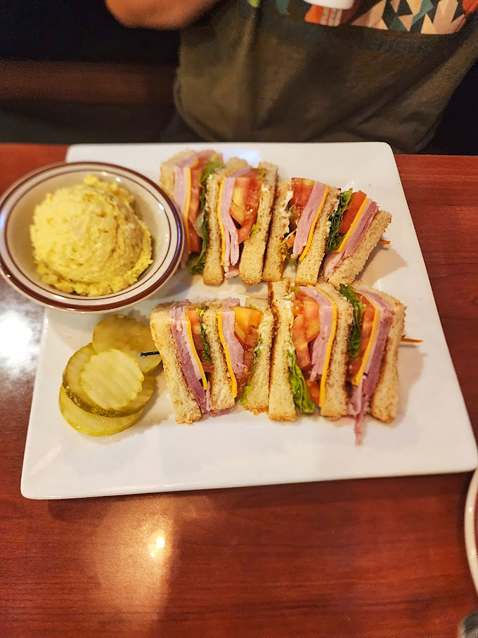 The Leaning Tower of Sandwich! This club is stacked higher than your road trip luggage.