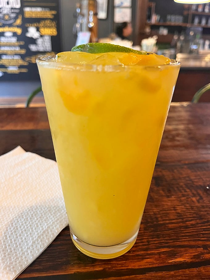 Cocktail: Sunshine in a glass&mdash;this bright yellow cocktail with a lime garnish promises tropical escape with every refreshing sip.