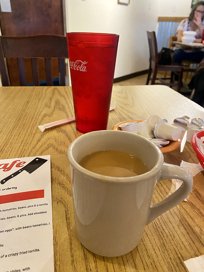 The coffee cup &ndash; a ceramic beacon of hope on sleepy mornings, promising liquid motivation that tastes nothing like chain-store mediocrity.