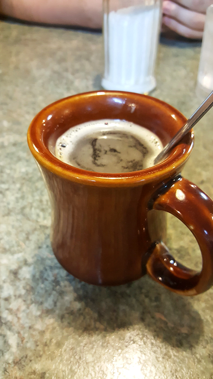 That sturdy ceramic mug isn't just holding coffee&mdash;it's cradling liquid motivation in a vessel designed for serious caffeine enthusiasts.