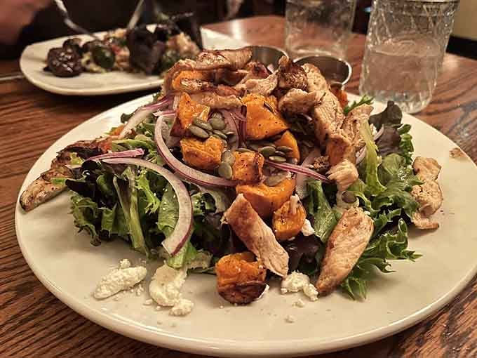 Fresh greens, roasted butternut squash, and perfectly cooked chicken make this salad a legitimate meal, not an afterthought.