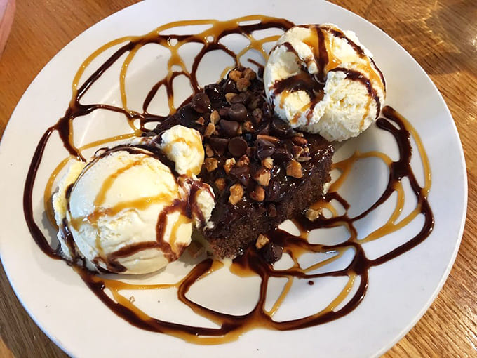 The turtle brownie with vanilla ice cream is what happens when chocolate, caramel, and pecans throw a party on your plate.