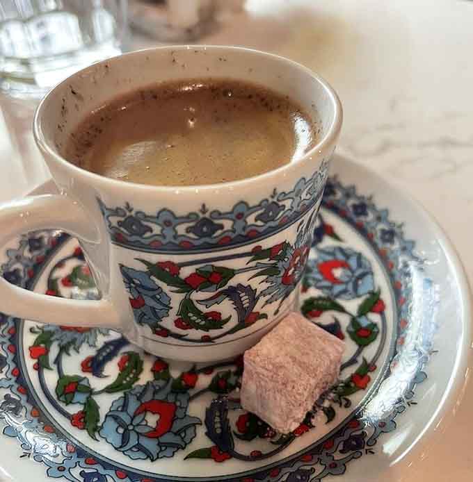 Turkish coffee arrives in traditional cups, thick and rich enough to fuel conversations and possibly predict your future.