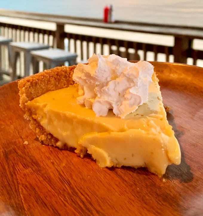 That Key Lime Pie slice is sunshine in dessert form, tart and creamy enough to make you consider ordering seconds.