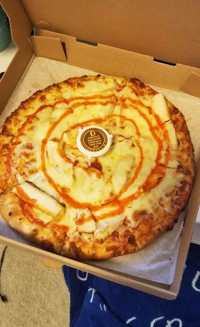 Buffalo chicken pizza delivers the heat with a cheesy base that helps cool things down between bites.