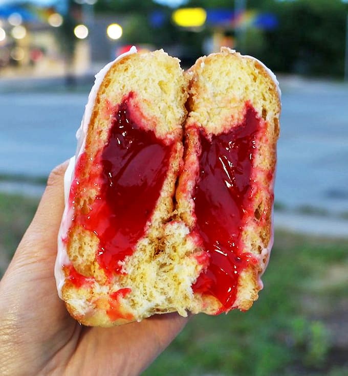Raspberry Donut: Cut one open and watch that ruby filling ooze out like sweet lava &ndash; nature's way of saying "diet tomorrow, indulge today."