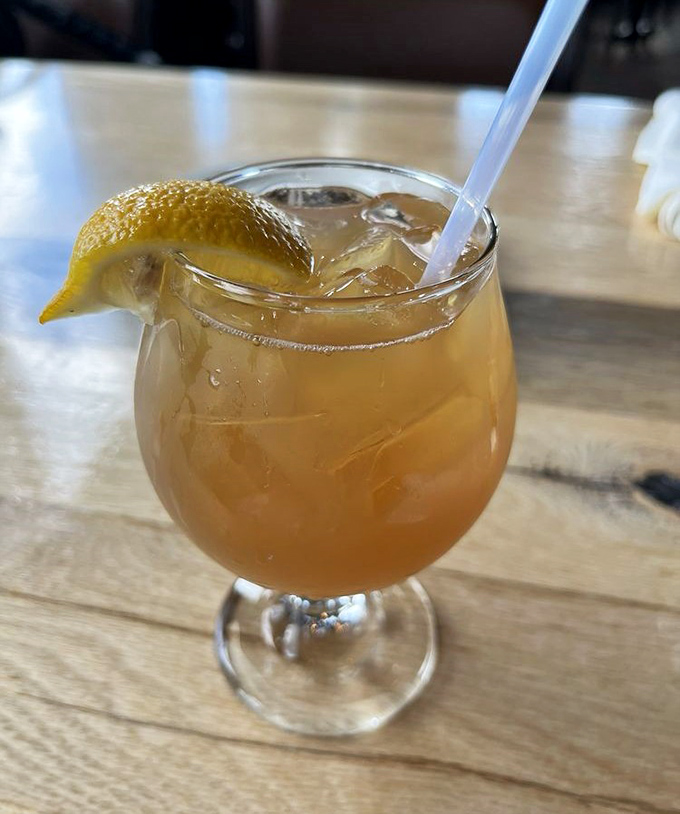 DiMillo's signature cocktails, like this refreshing rum punch with lemon, provide the perfect liquid accompaniment to their legendary seafood offerings.