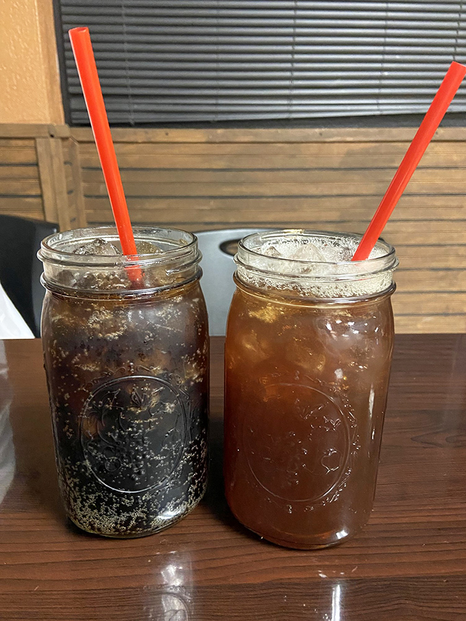 Mason jar beverages&mdash;sweet tea and soda&mdash;served Southern-style, because proper hydration is essential when dancing with Cajun spices.