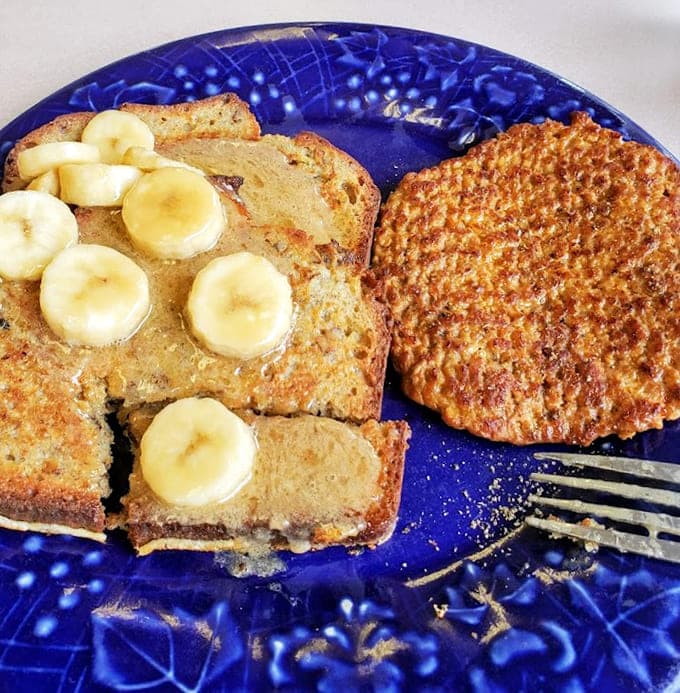 Banana bread French toast with actual banana slices, because apparently someone asked "what if breakfast, but make it fancy?" and nailed it.