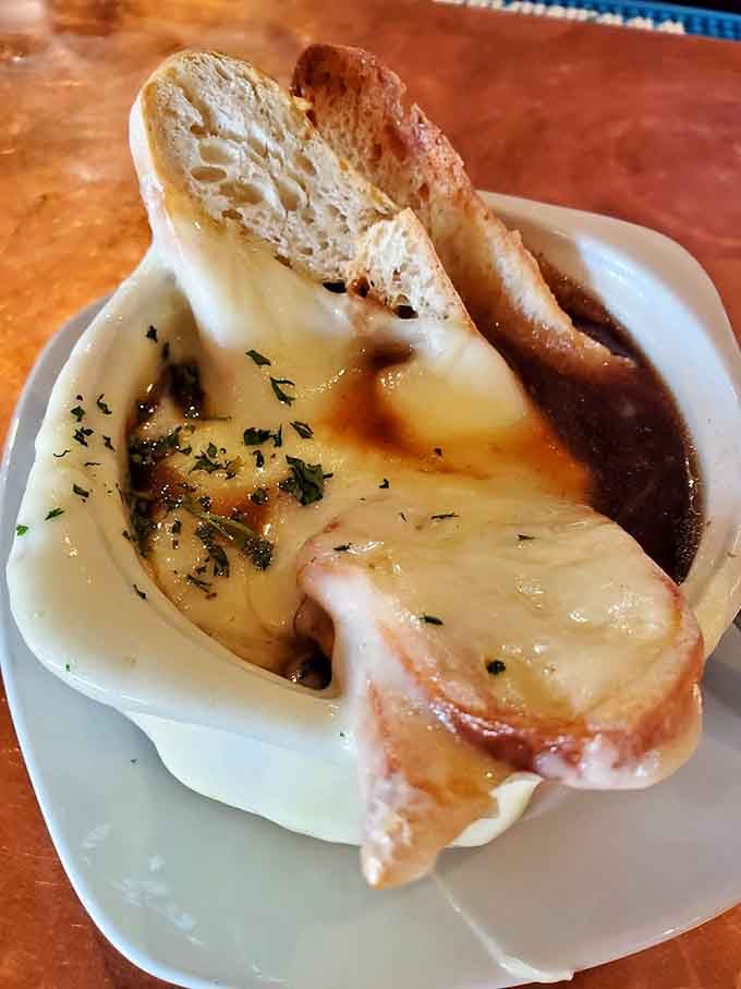 French onion soup topped with melted cheese, because sometimes you need comfort in a bowl with crusty bread.
