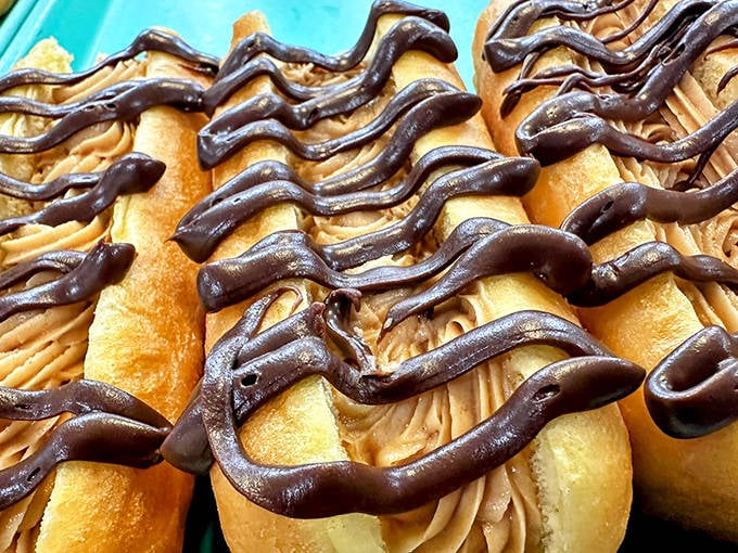 These eclairs aren't just pastries &ndash; they're architectural masterpieces of chocolate and cream that collapse beautifully with each blissful bite.