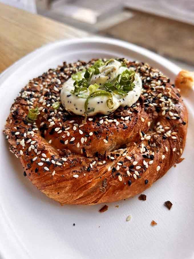 This everything bagel croissant topped with cream cheese and scallions bridges the breakfast divide &ndash; is it a bagel? A croissant? It's perfection.