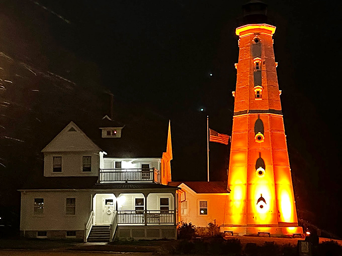 Night fever! The lighthouse glows like a giant nightlight, guiding ships and capturing hearts. It's disco ball meets maritime safety&mdash;groovy and practical!