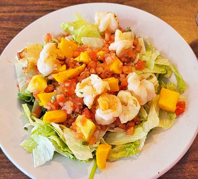 A shrimp salad where mangoes and seafood dance together in perfect harmony&mdash;proof that healthy eating doesn't have to be a punishment.