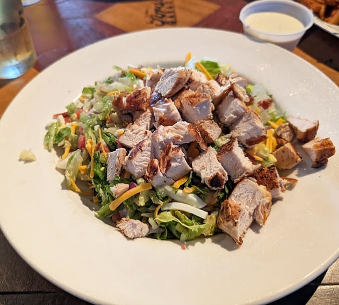 Fresh greens topped with generous portions of protein make this Cobb salad a lighter option that doesn't sacrifice flavor or satisfaction, perfect for pretending you're being healthy.