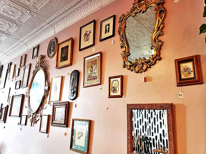 Gallery walls filled with mismatched frames and vintage finds give the space personality that no corporate designer could ever replicate.