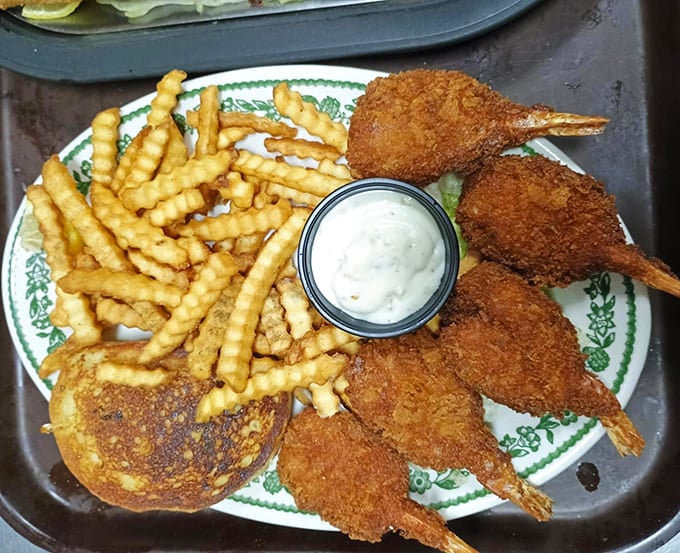 Breaded shrimp arrive like golden treasures, each one a crunchy commitment to doing fried seafood absolutely right.