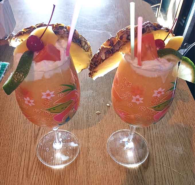 Tropical drinks garnished with pineapple wedges transport you somewhere warmer than Minnesota, at least mentally.