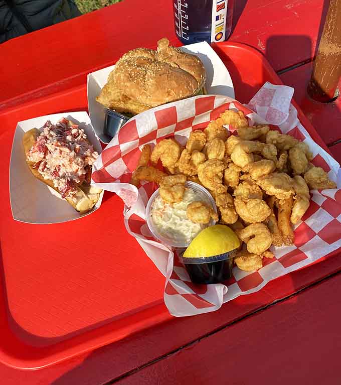 Dining at a picnic table with a feast spread before you is the kind of luxury that money can't really buy, just good taste.