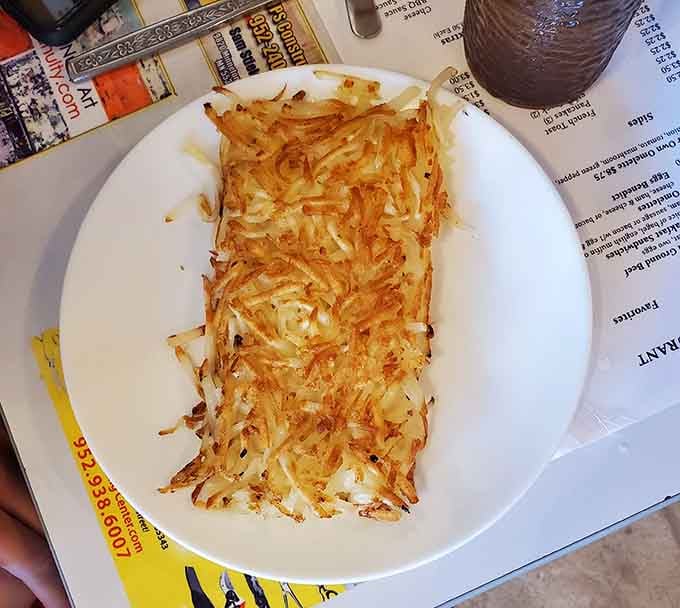 Hash browns achieve that elusive crispy-outside, tender-inside perfection that separates the amateurs from the pros in the breakfast game.