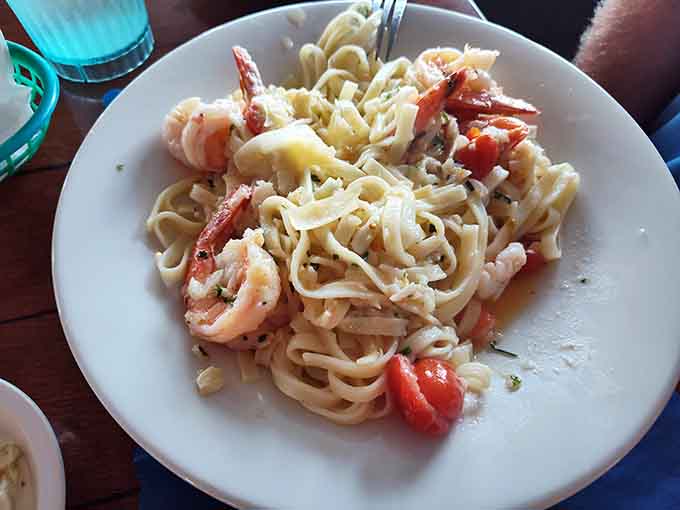 Shrimp and pasta tangled together in garlicky goodness, because sometimes the simplest preparations let quality ingredients shine brightest.