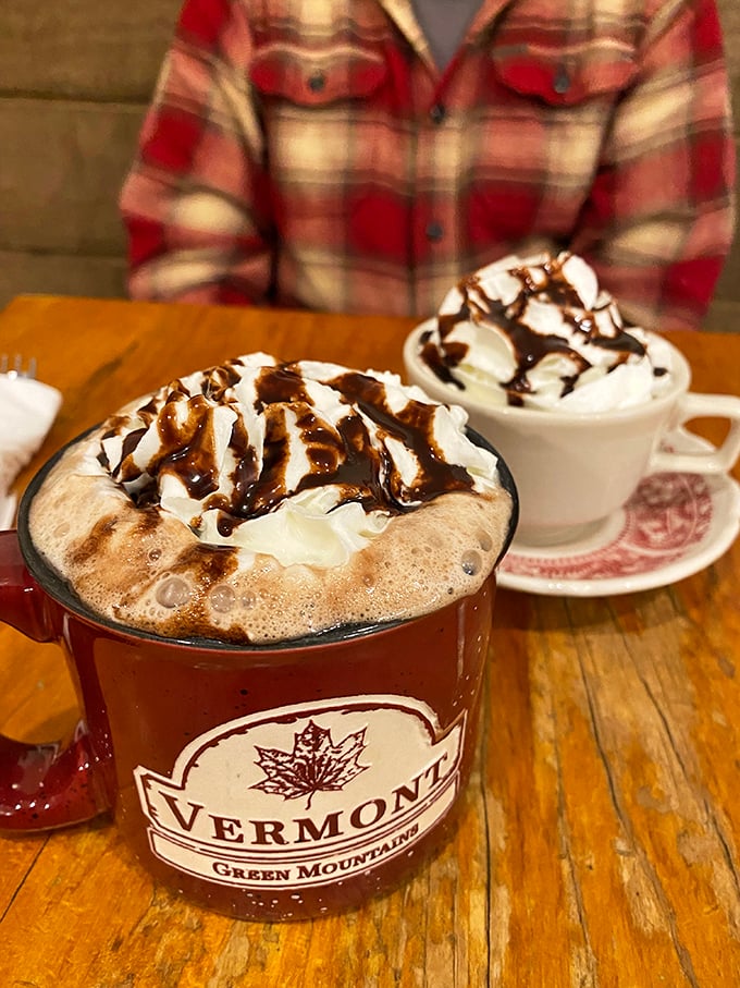 Vermont winters demand serious hot chocolate &ndash; topped with whipped cream mountains and chocolate drizzles that turn sipping into a religious experience.