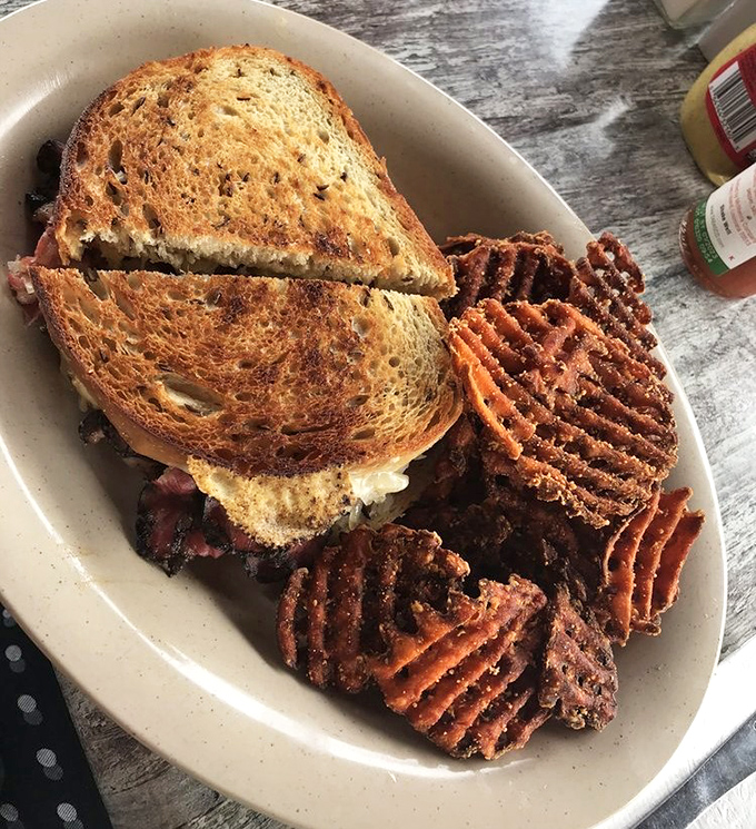 A tower of thinly-sliced pastrami perfection with those addictive waffle fries – lunch that makes breakfast jealous.