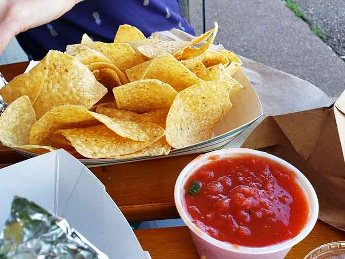 Fresh tortilla chips and house-made salsa starting your meal off right, because every great culinary journey needs a proper beginning.